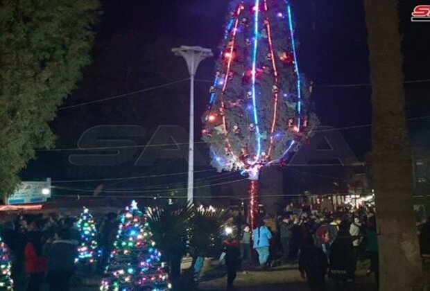 Lighting a Christmas tree at Hasaka City Center