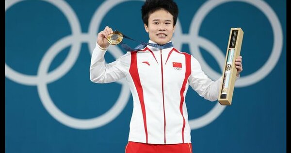 In pics: Chinese weightlifter Hou wins women's 49kg at Paris 2024