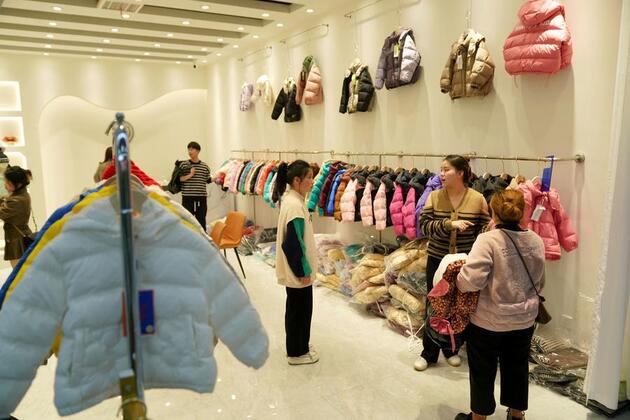 China's "down jacket capital" keeps world warm with design, quality push