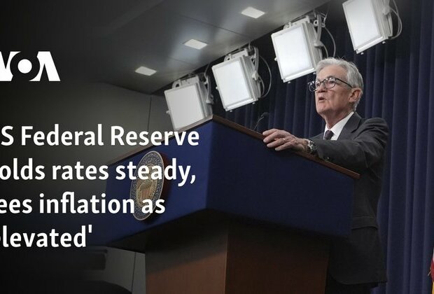 US Federal Reserve holds rates steady, sees inflation as 'elevated'