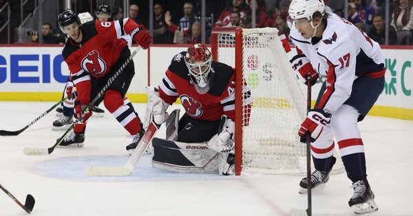 Streaking Devils drop Capitals behind Jack Hughes' hat trick