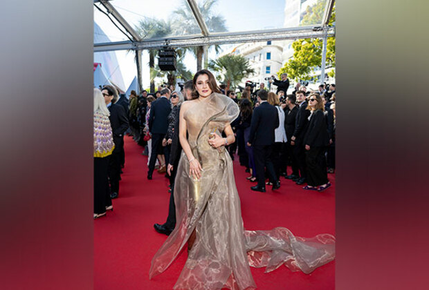 Singer Aastha Gill's red carpet debut in elegant gold ensemble steals ...
