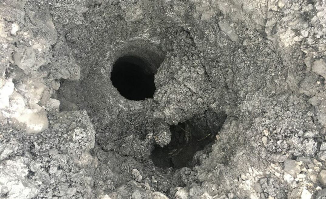 Blast hole near miss