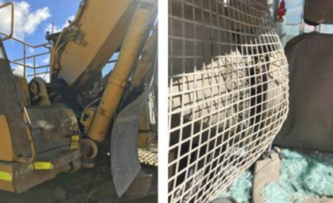 Warning after boom foot kicks cab window