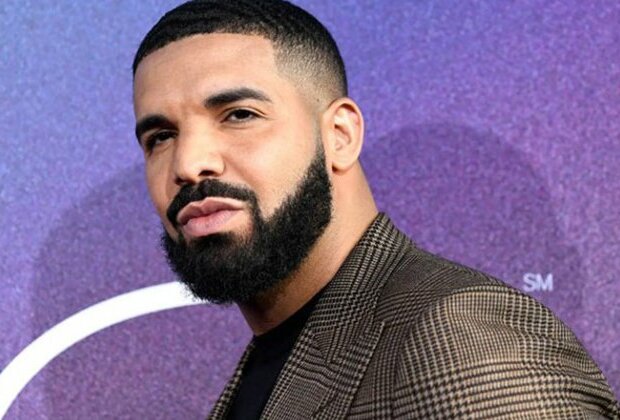 Drake leaves hotel in bulldog mask ahead of 'For All the Dogs' release