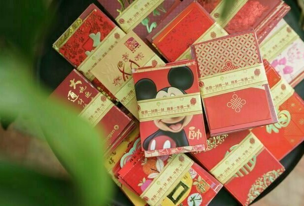 What is the story of hongbao, the red envelopes given out at ...