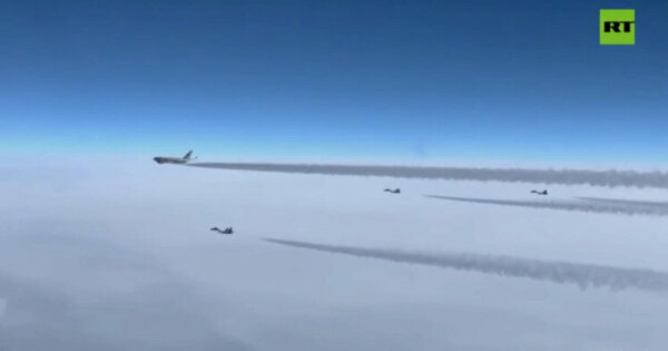 fighter jets escort Putins plane into Kazakhstan