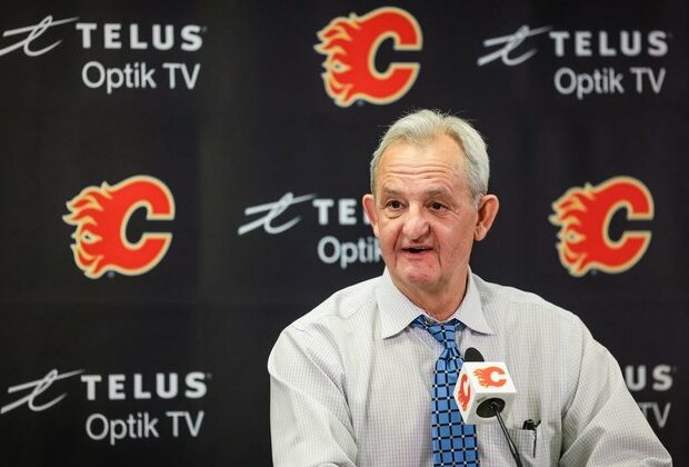 Flames fire coach Darryl Sutter