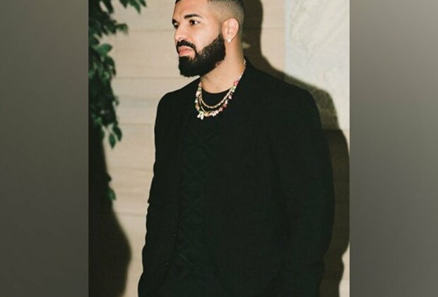 Rapper Drake posts cute picture of his son watching his concert