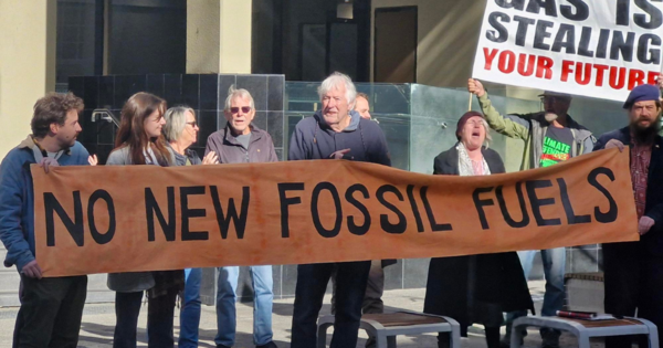 Woodside protestor fined for blocking road to gas plant