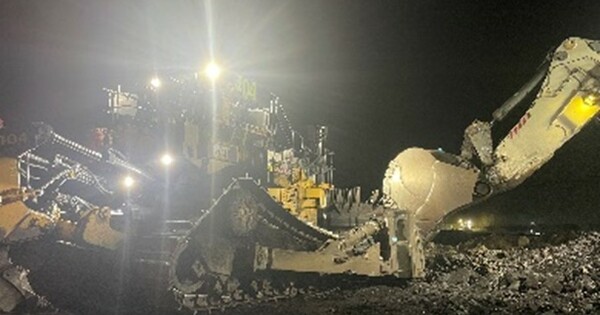 Excavator takes a swing at dozer