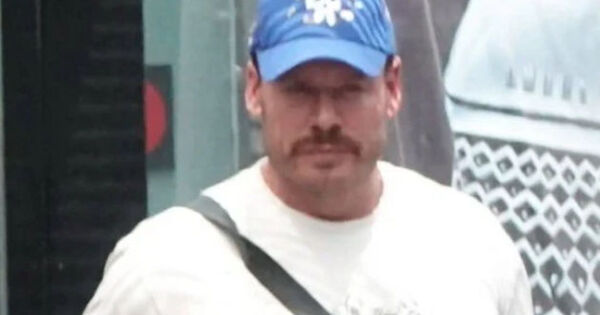 Wanted Canadian ex-athlete now accused in murder of federal witness