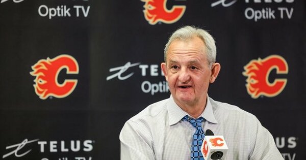 Flames fire coach Darryl Sutter
