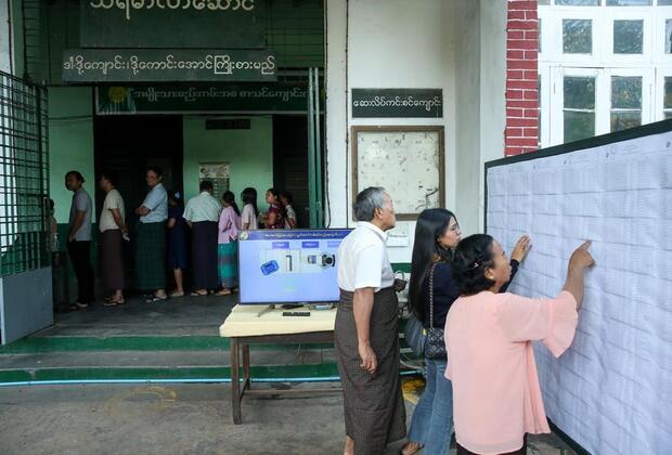 Myanmar voters cast votes in first phase of election to open new ...