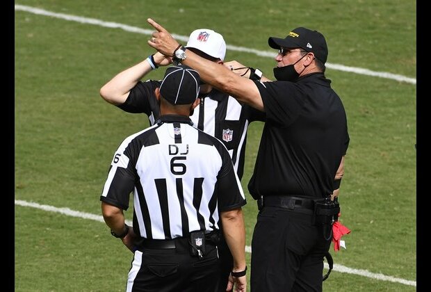 NFL to penalize talking to refs without a mask